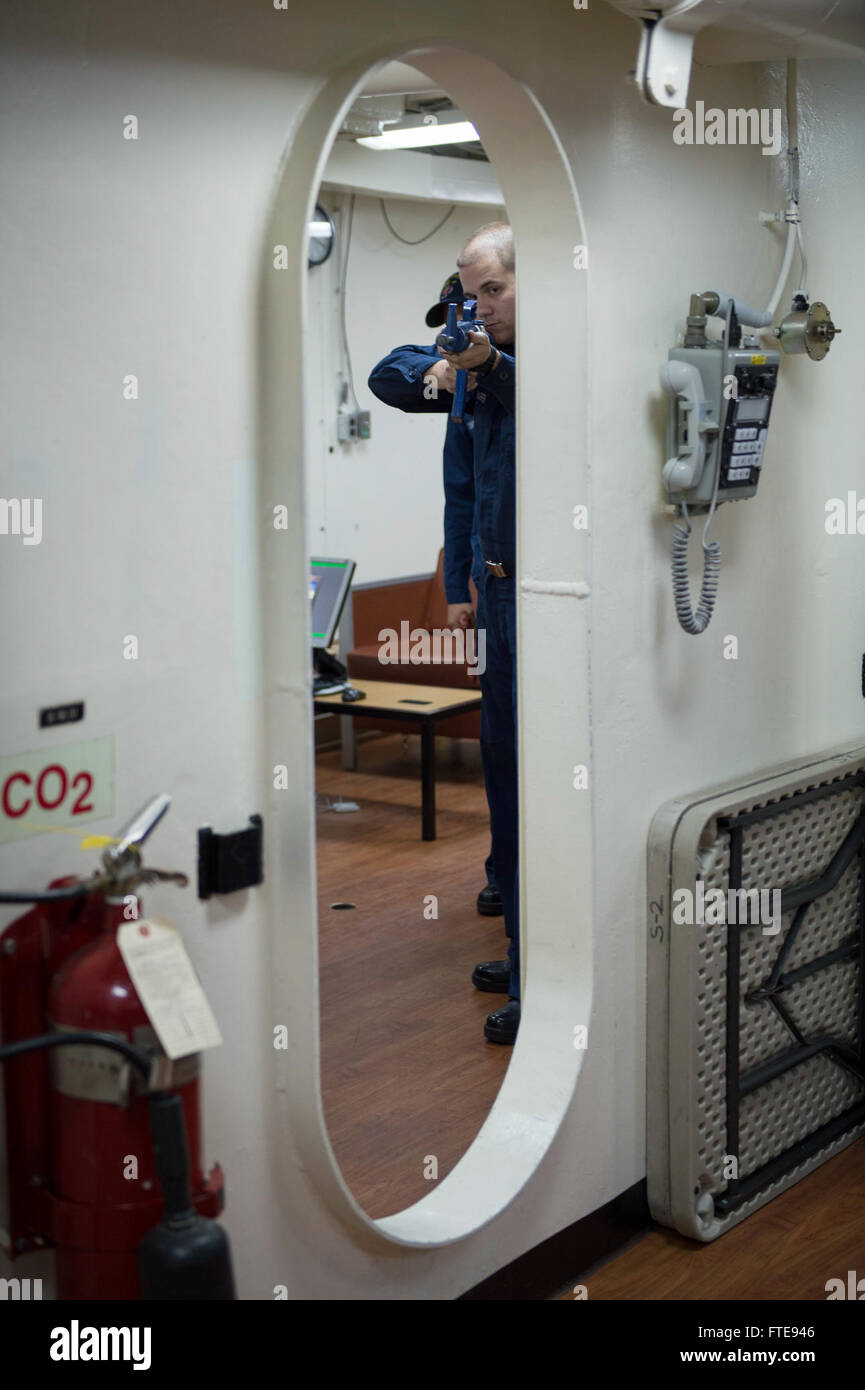 This photograph shows Gunner's Mate Seaman David Harper performing ...