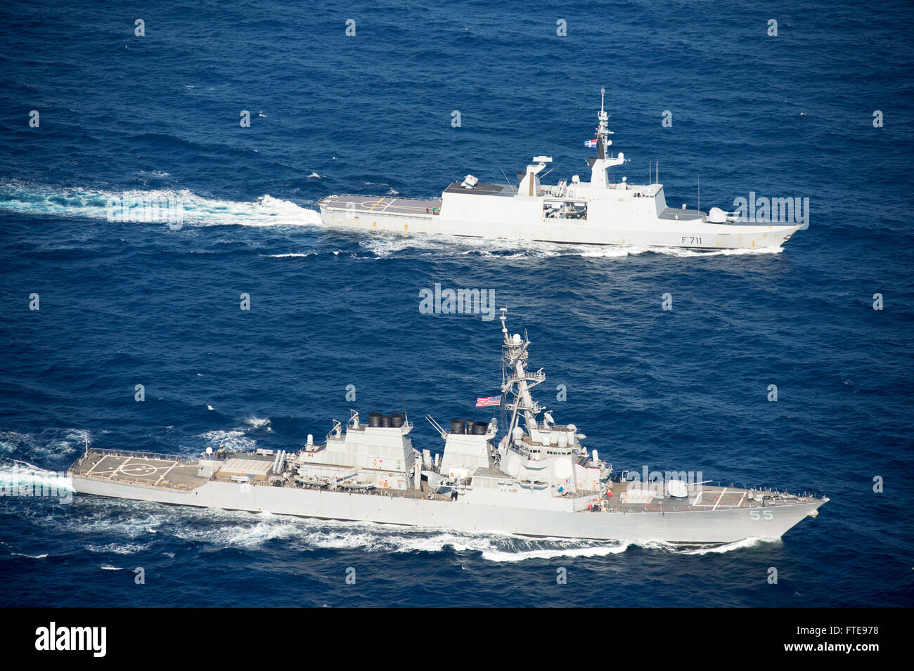 The Arleigh Burke-class guided-missile destroyer USS Stout (DDG 55) is ...