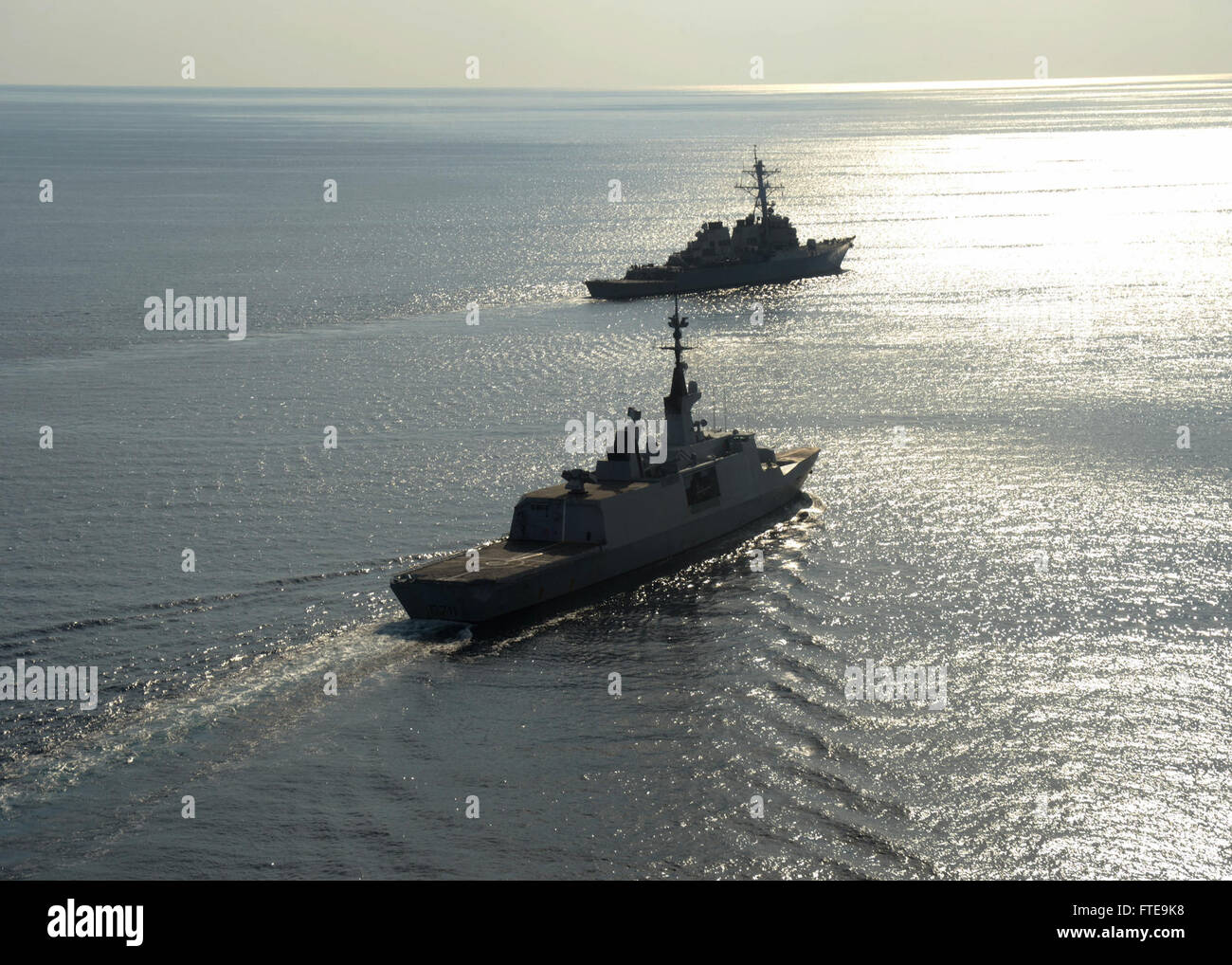 The guided-missile destroyer USS Ramage (DDG 61) and the French navy ...