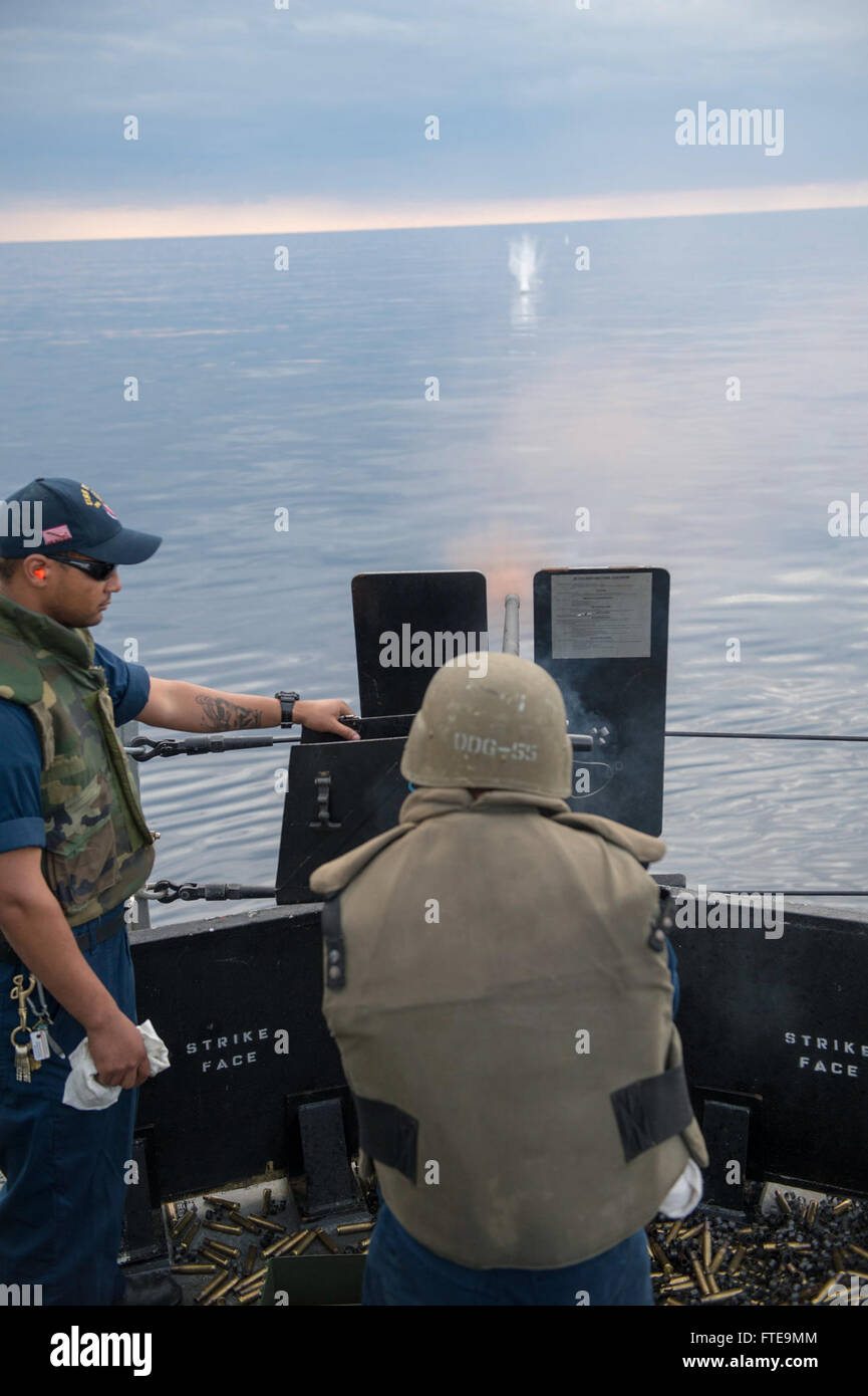 This image shows Gunnerâ€™s Mate 2nd Class Gregory Spaulding observing ...
