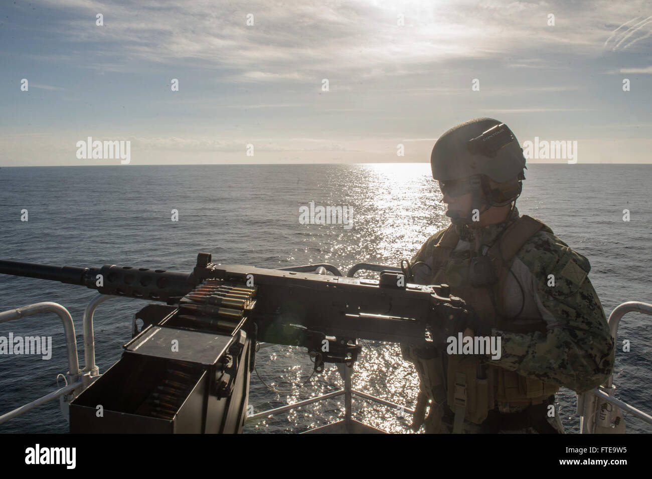 Gunner's Mate Seaman Enrique Ramirez is seen training with a .50 ...