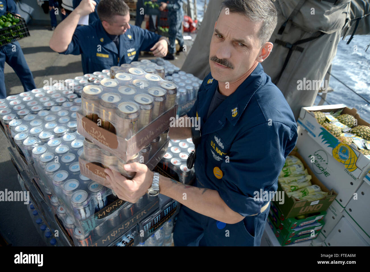 The USS Ramage (DDG 61) conducts a replenishment-at-sea with the USNS ...
