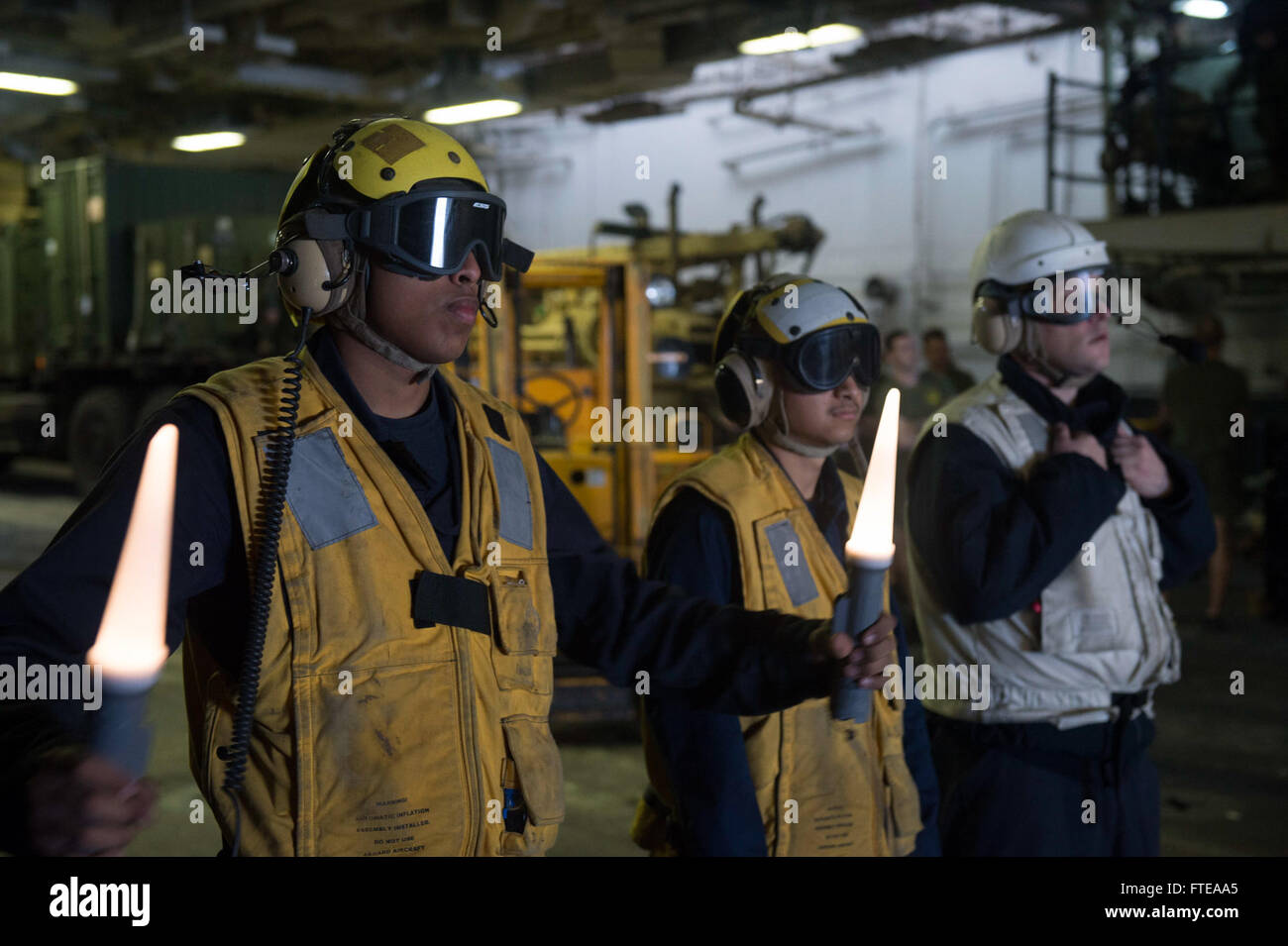 This U.S. Navy photo captures Sailors assisting in docking a Landing ...