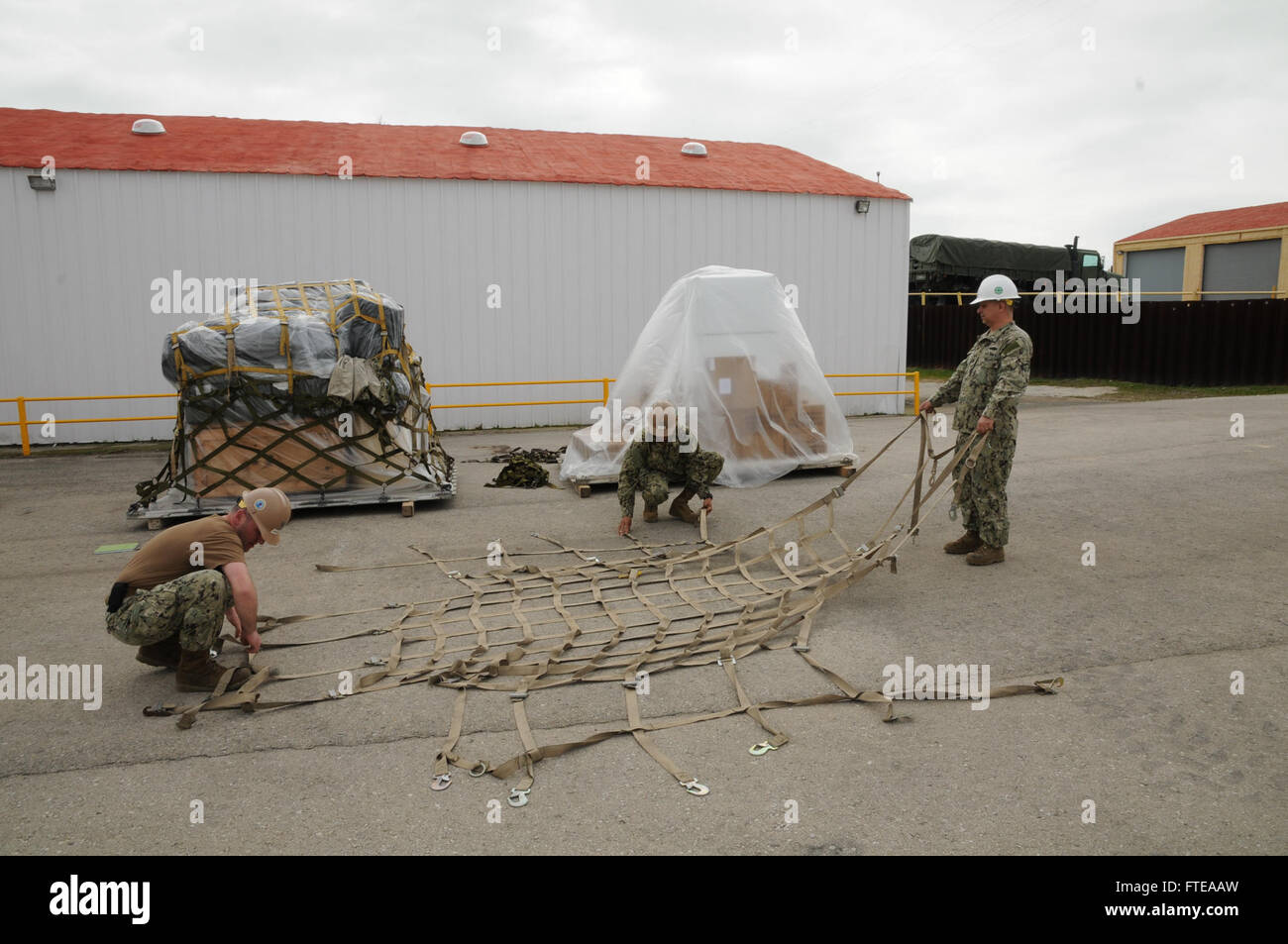 U.S. Navy personnel from Naval Mobile Construction Battalion 74 (NMCB ...