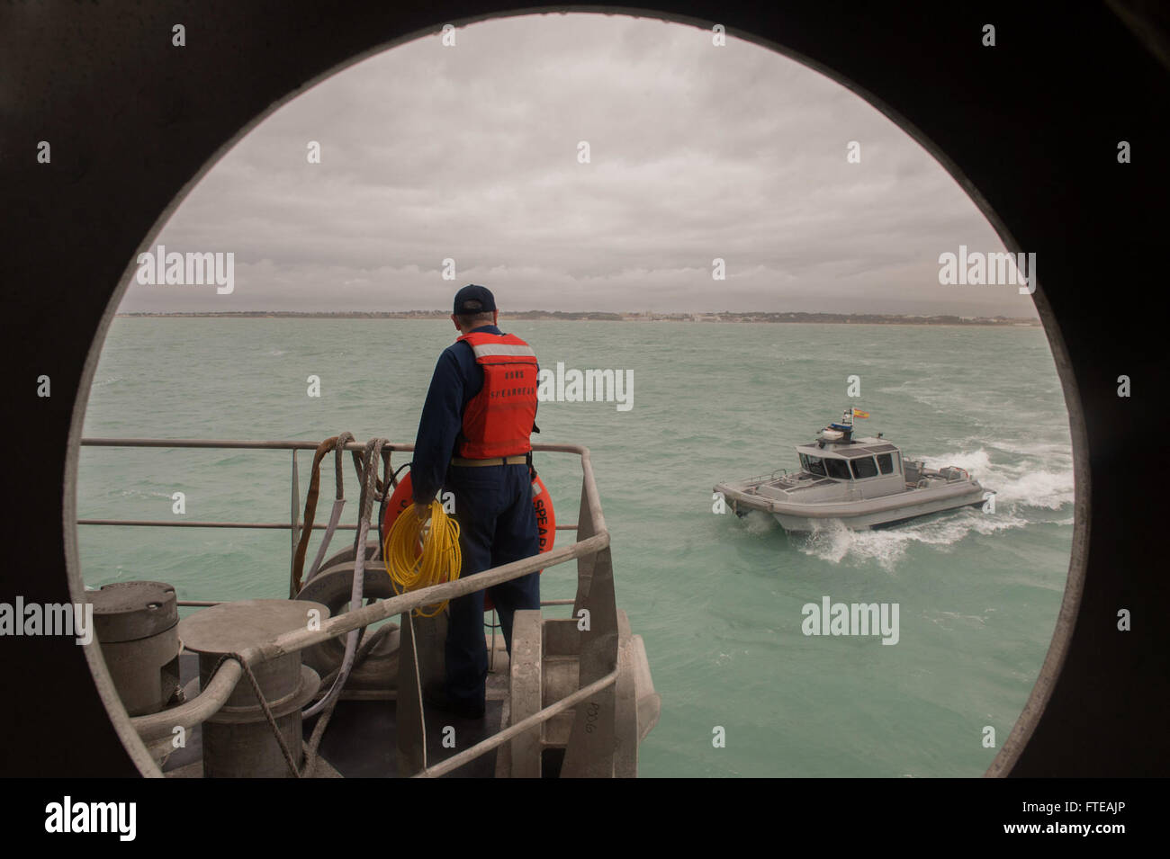 Chief Yeoman Hector Gonzales aboard the USNS Spearhead (JHSV 1), a U.S ...