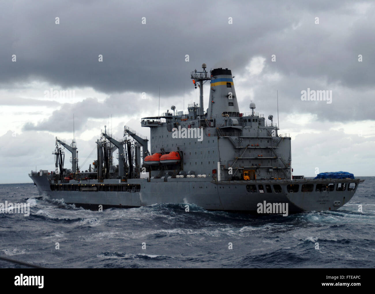 The image shows the USNS John Lenthall (T-AO 189) preparing for an ...