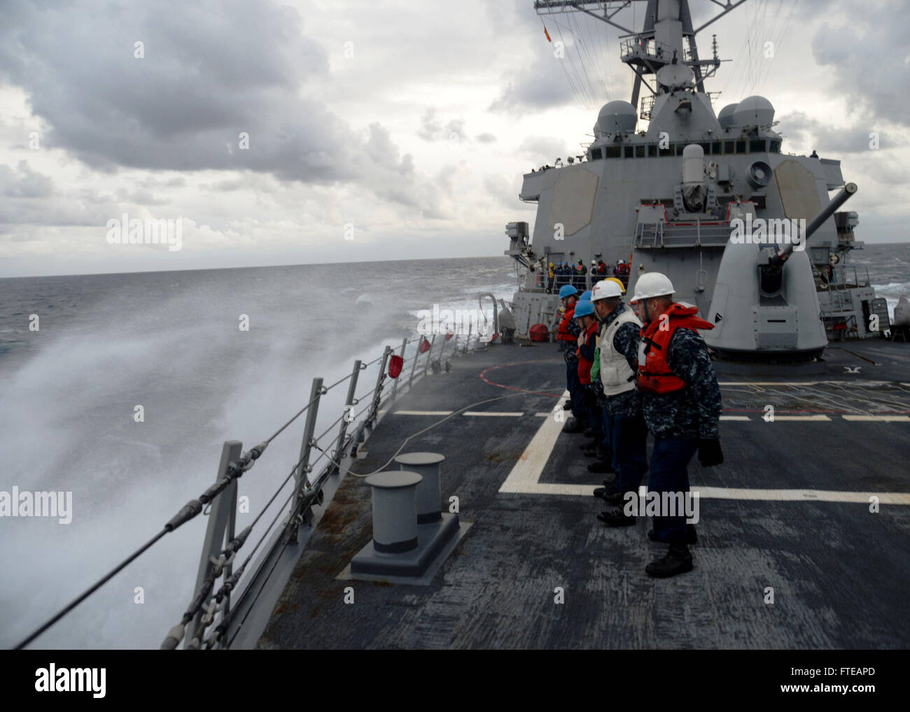 This image captures U.S. Navy Sailors aboard the USS Ramage, a guided ...