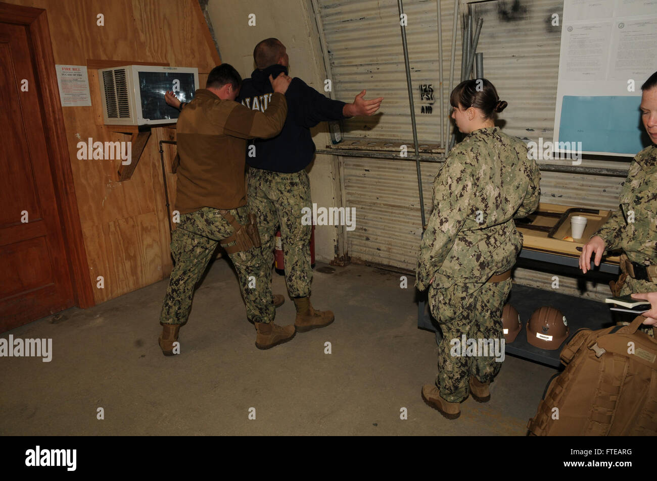 The U.S. Navy's Reaction team conducts an evacuation control exercise ...
