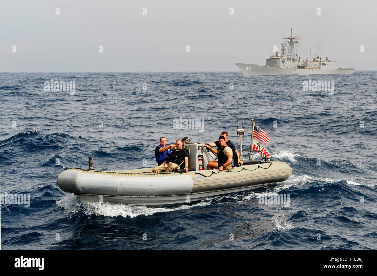 On June 23, 2012, sailors aboard the USS Simpson (FFG 56), a guided ...