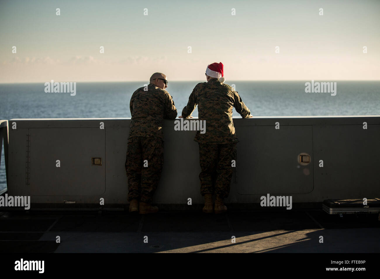 This photograph shows Lieutenant Cmdr. John Carter, a troop chaplain ...