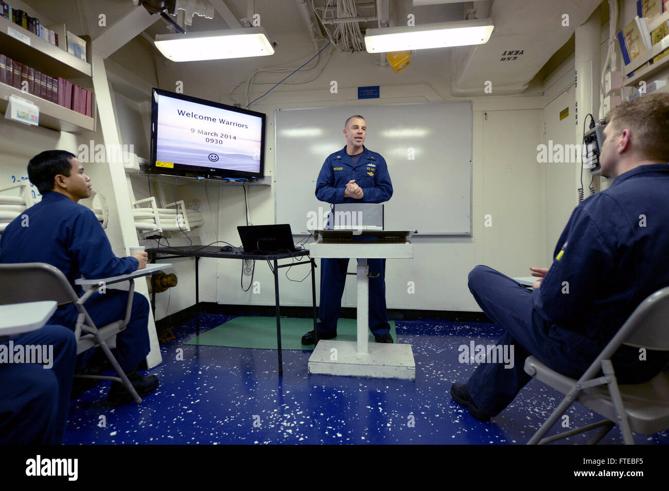 Lt. Allen Presser of the USS Ramage (DDG 61) conducts a Christian ...