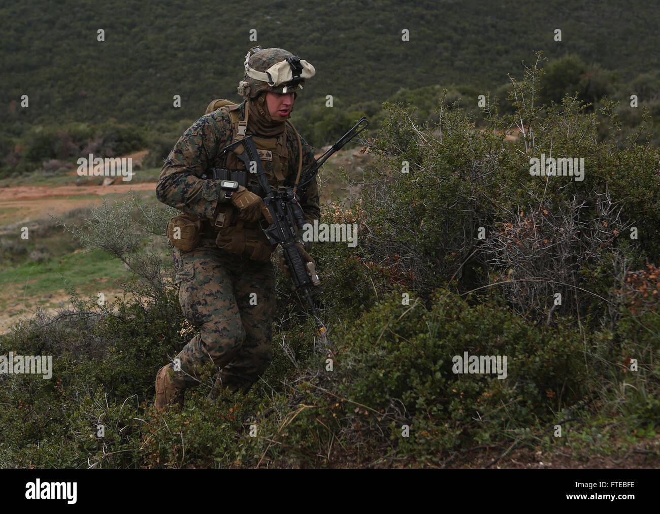 A U.S. Marine from Battalion Landing Team 1st Battalion, 6th Marine ...
