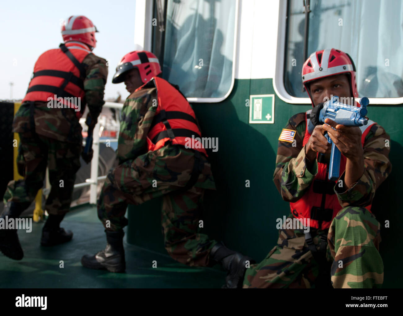 Liberian Coast Guardsmen conduct maritime interdiction training aboard ...
