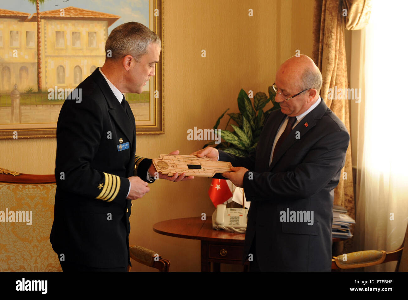 This image shows Capt. Andrew Loiselle, commanding officer of the USS ...