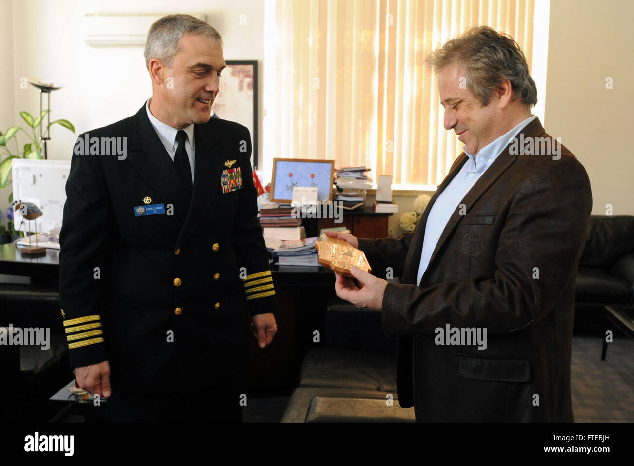 Capt. Andrew Loiselle, commanding officer of the USS George H.W. Bush ...