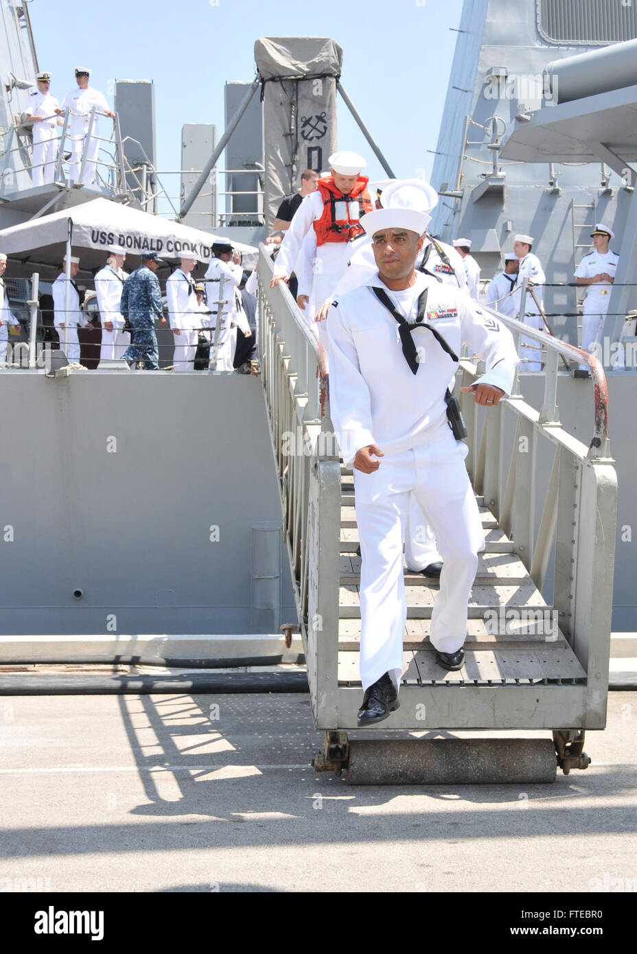Sailors aboard the USS Donald Cook (DDG 75) return to Naval Station ...
