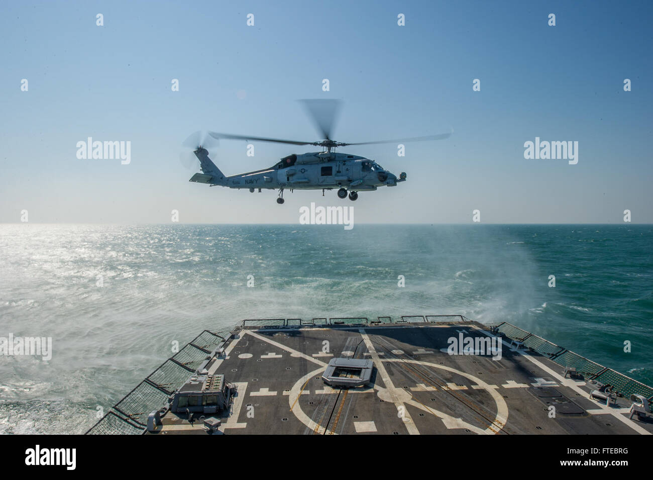An MH-60R Seahawk helicopter from Helicopter Maritime Strike Squadron ...