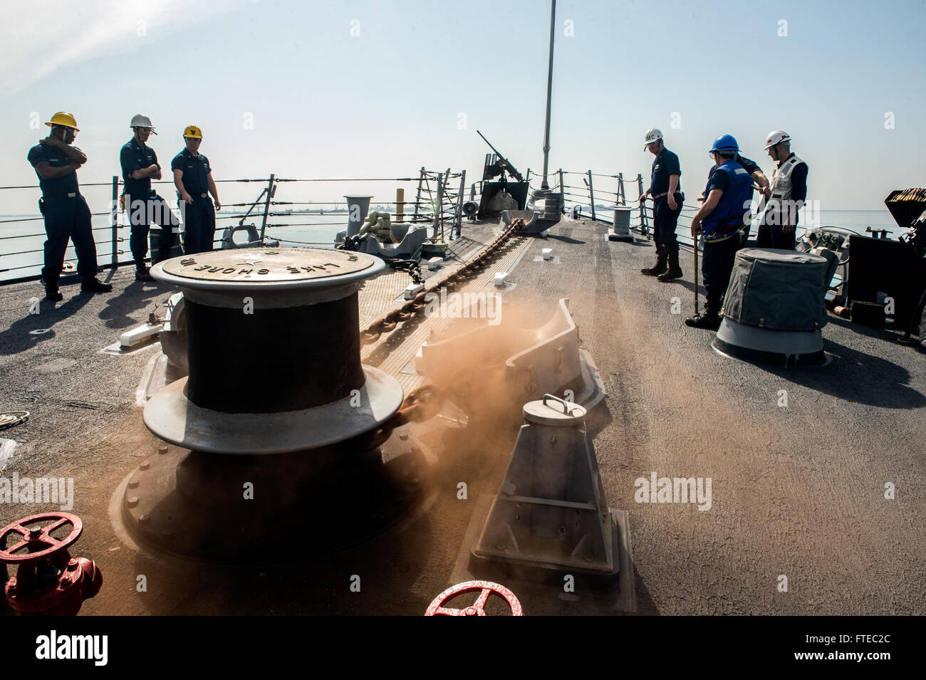 This image captures sailors aboard the USS Donald Cook (DDG 75 ...