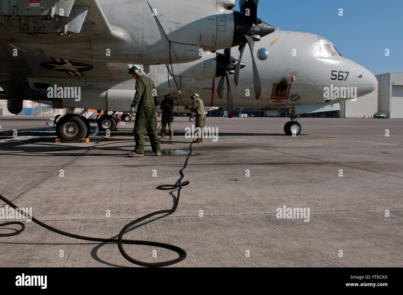 Sailors from the 'Golden Eagles' of Patrol Squadron (VP) 9 perform an ...