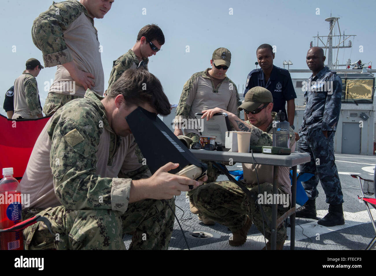 GULF OF GUINEA (March 26, 2014) - Sailors assigned to the PUMA unmanned ...