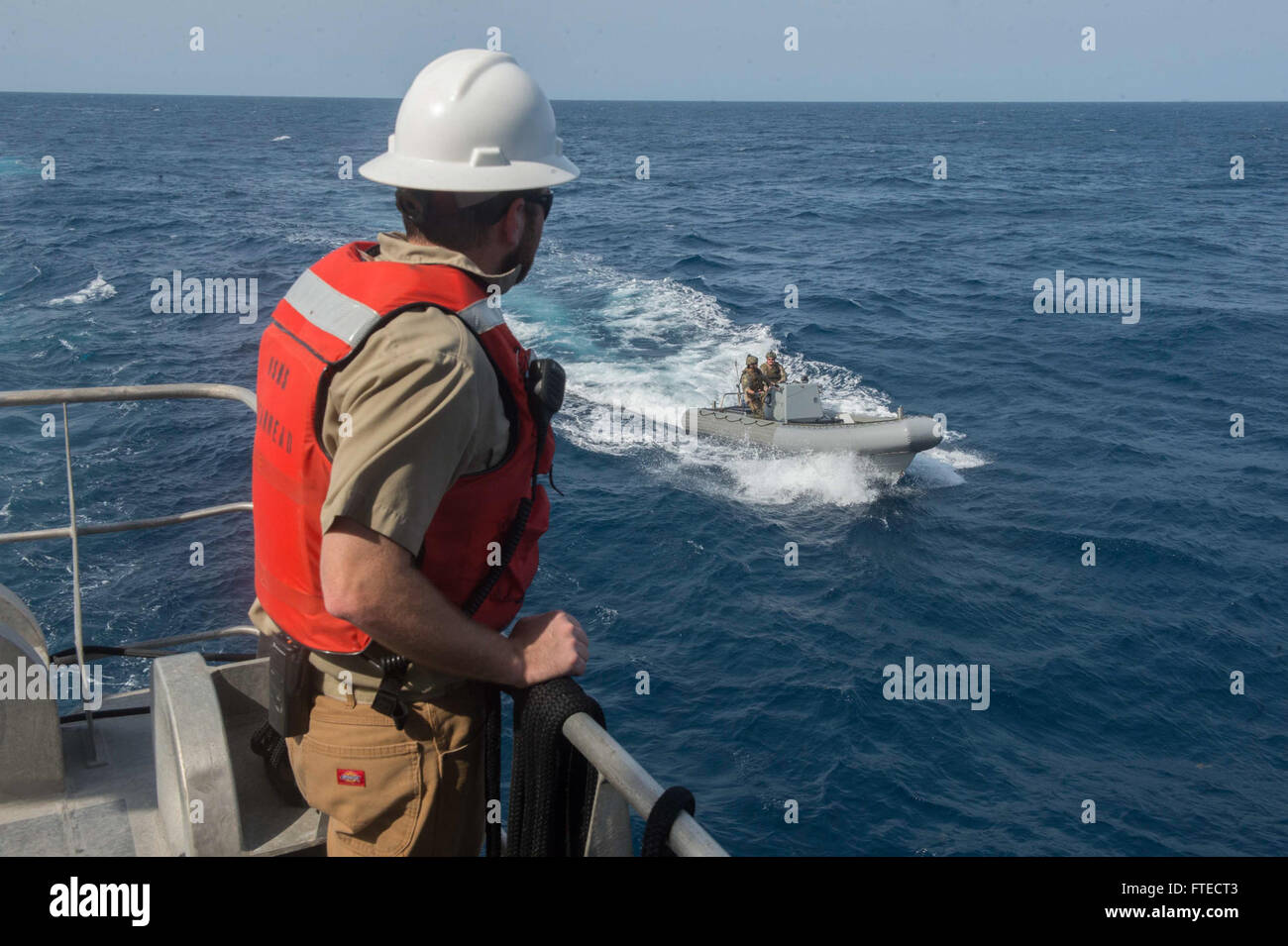 140327-N-ZY039-076 GULF OF GUINEA (March 27, 2014) - James Regan, chief ...
