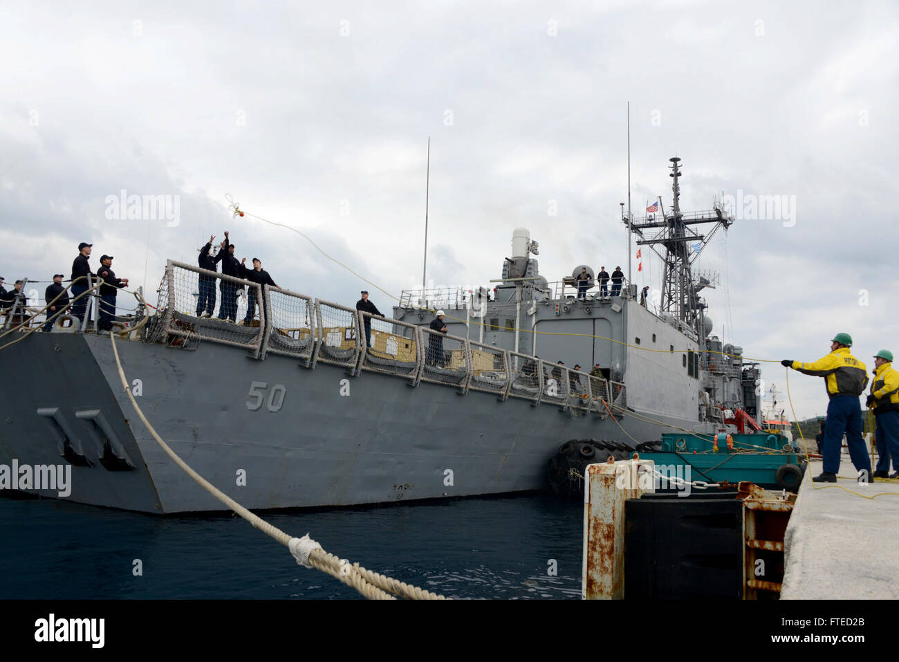 The USS Taylor (FFG 50), a guided-missile frigate, moors at the Marathi ...
