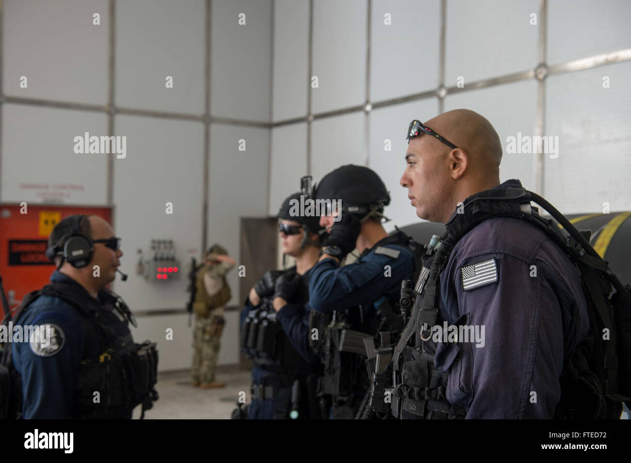 Members of the U.S. Coast Guard participate in a maritime law ...