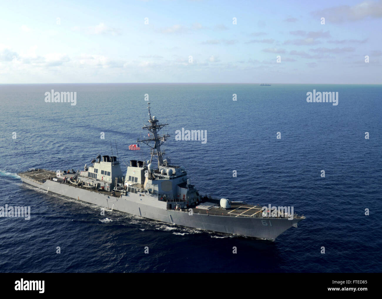 The USS Ramage (DDG 61), a guided-missile destroyer, participates in ...
