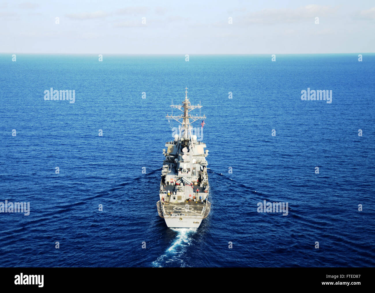 The USS Ramage (DDG 61), a guided-missile destroyer, participates in ...