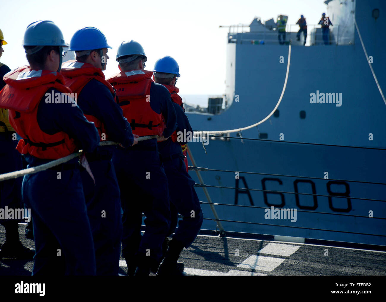 This U.S. Navy photograph shows sailors aboard the USS Ramage (DDG 61 ...