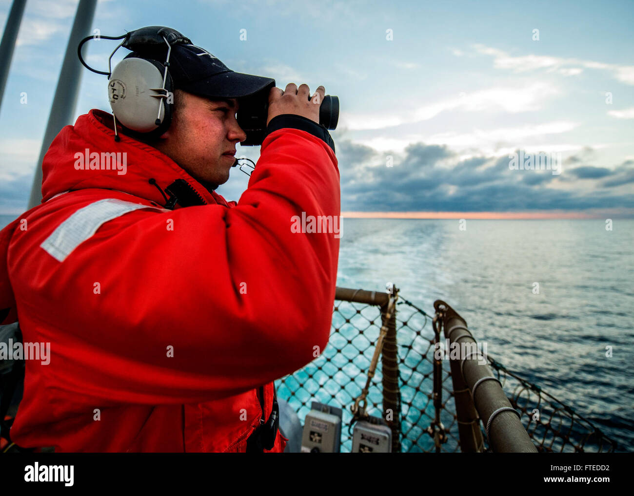 Seaman Matthew McKeever monitors surface contacts aboard the USS Donald ...