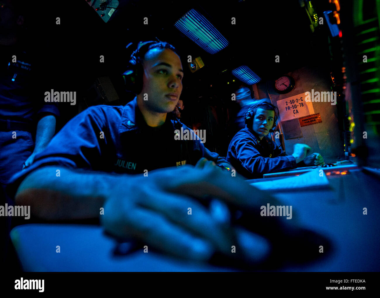 Sonar Technician 3rd Class Andrew Julien monitors underwater contacts ...