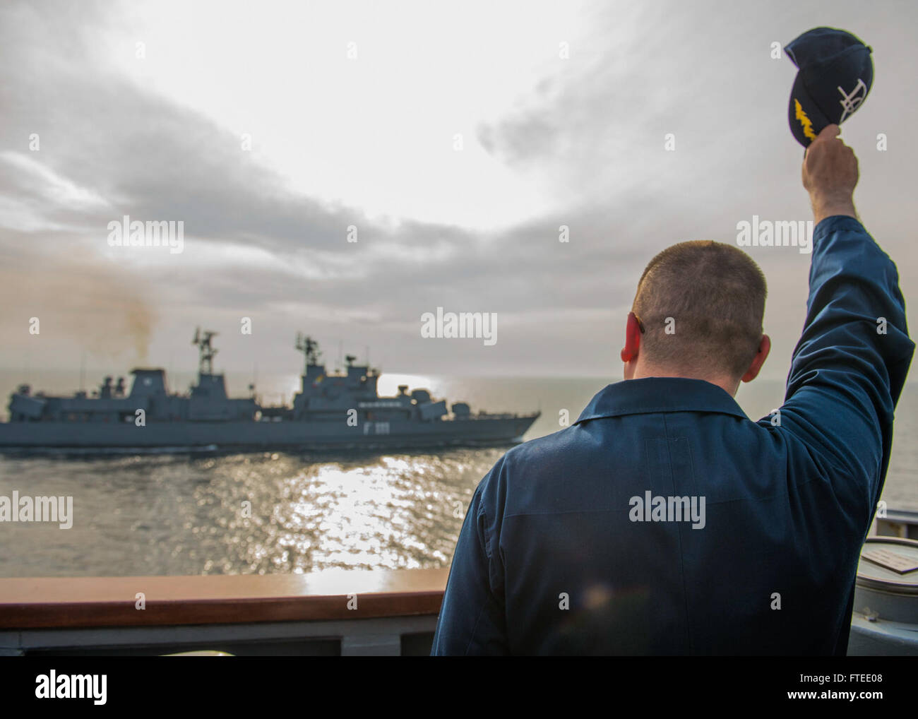 A photograph of Cmdr. Scott Jones, commanding officer of the USS Donald ...