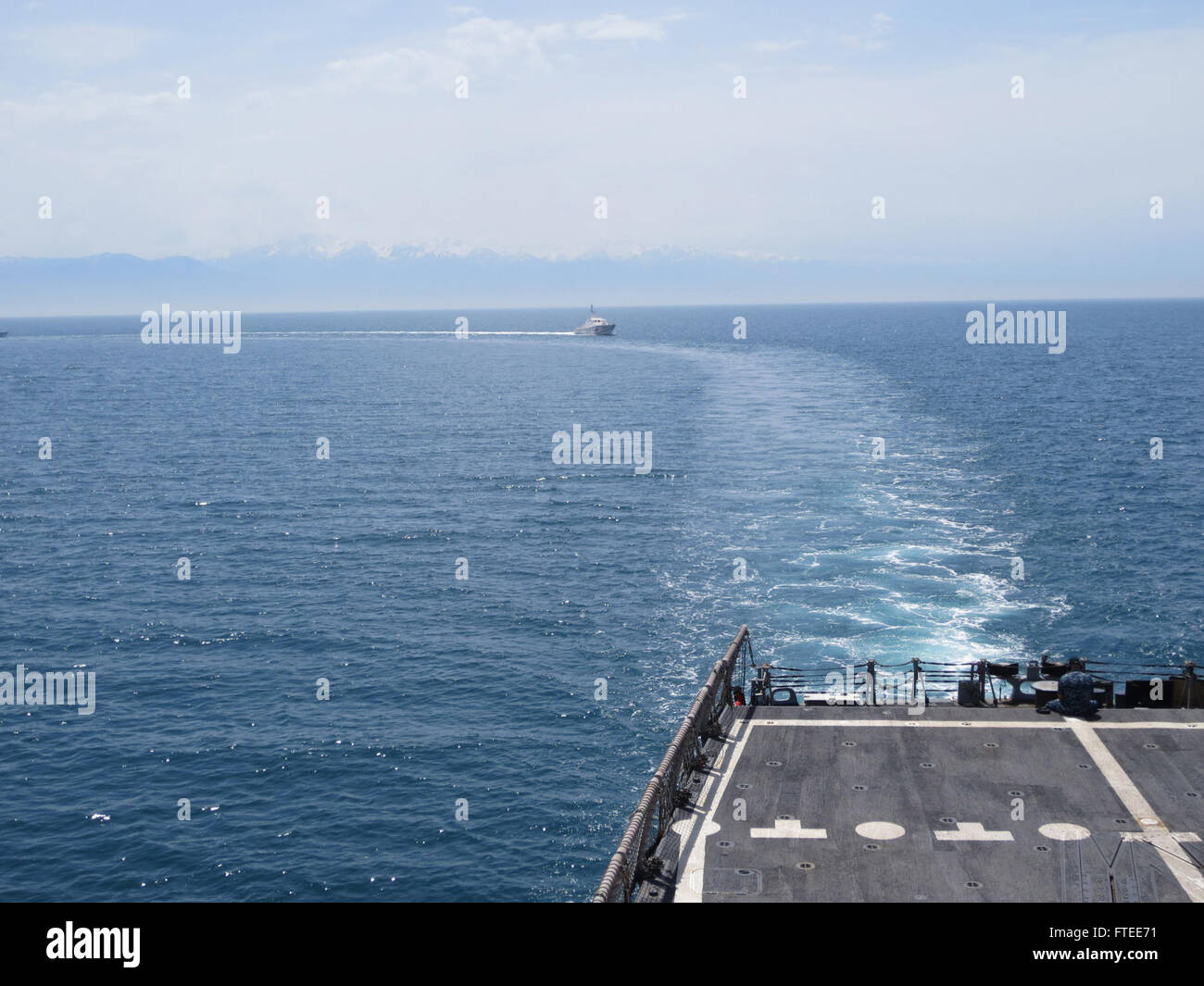 The guided-missile frigate USS Taylor (FFG 50) participates in tactical ...