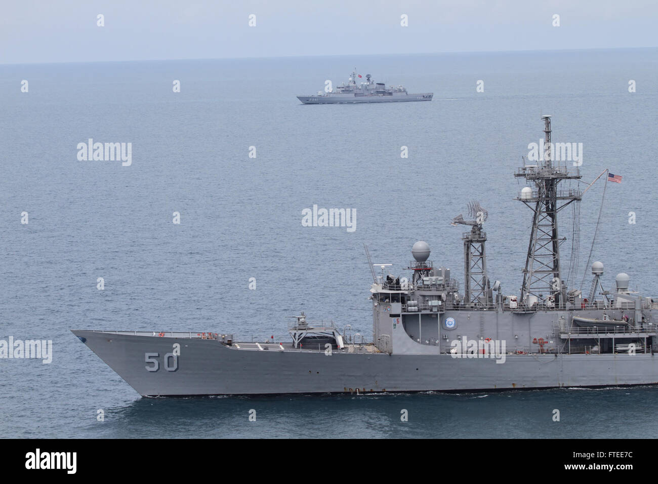 The U.S. Navy's guided-missile frigate USS Taylor (FFG 50) and the ...