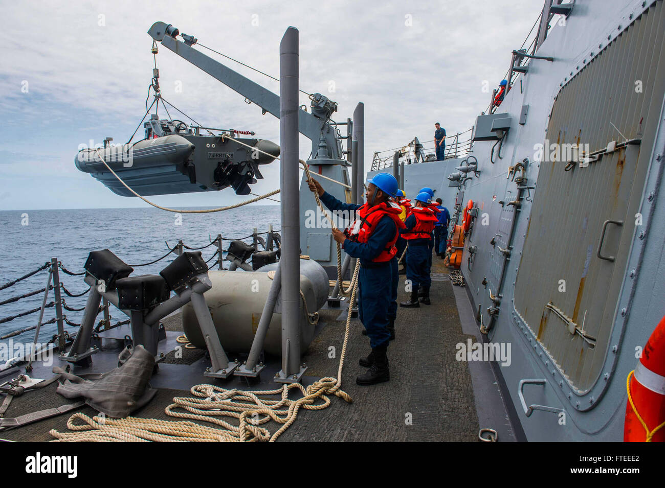 Sailors aboard the USS Oscar Austin (DDG 79) conduct maritime security ...