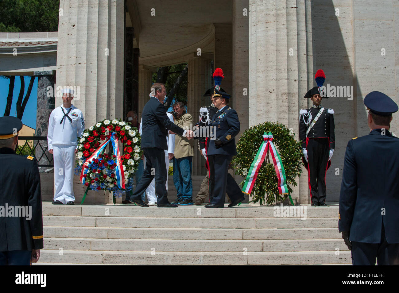 This photo captures a Memorial Day ceremony at the Sicily-Rome American ...