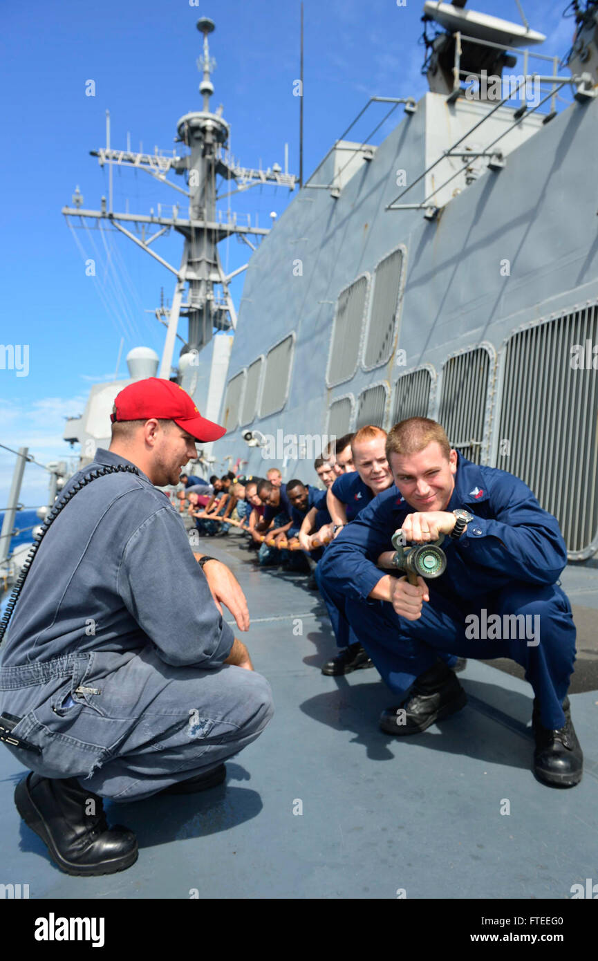 This image captures sailors aboard the USS Nitze (DDG 94) as they ...