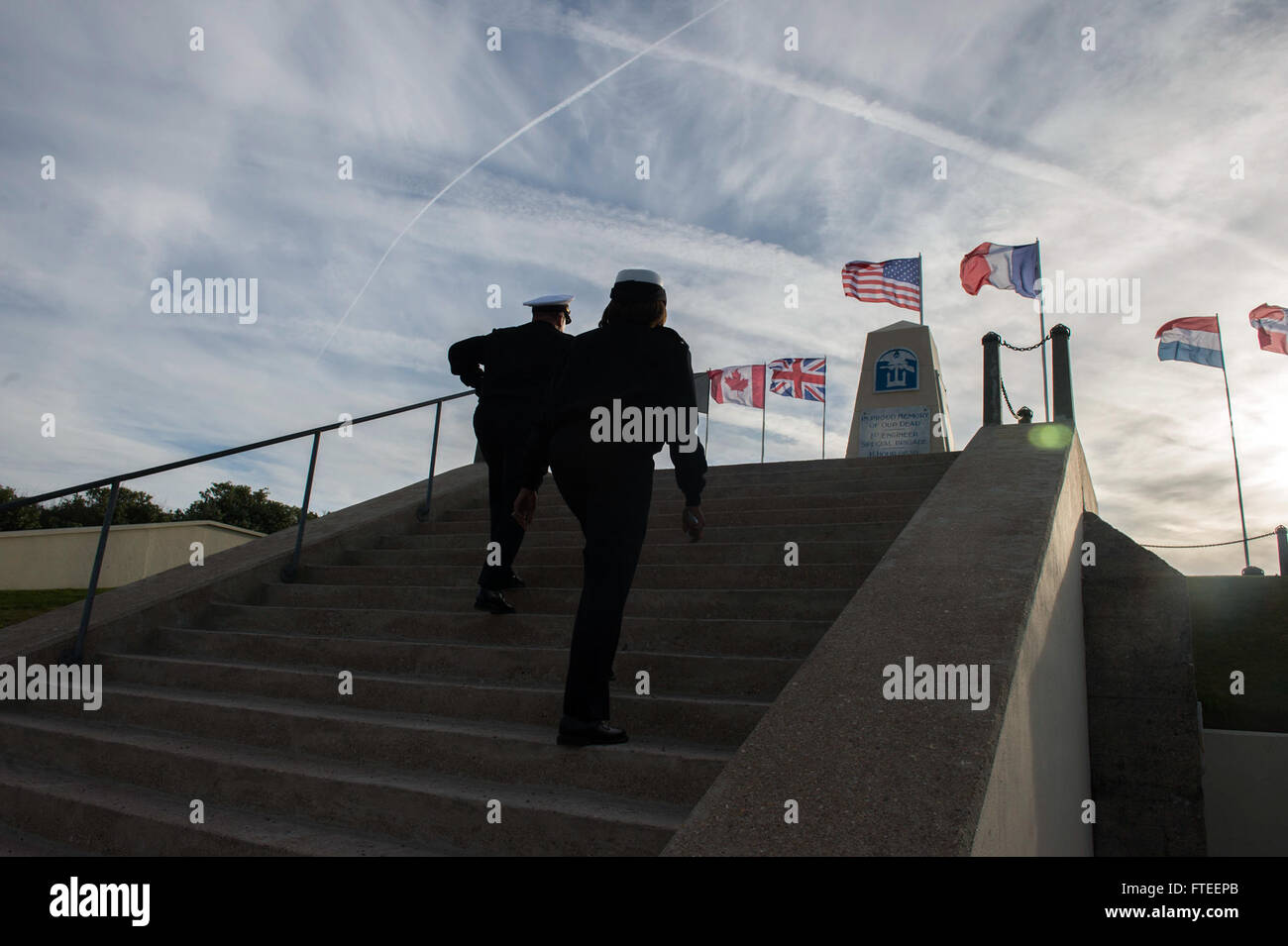 On June 6, 2014, Cmdr. Brian Diebold and CMDCM Dee Allen of the USS ...