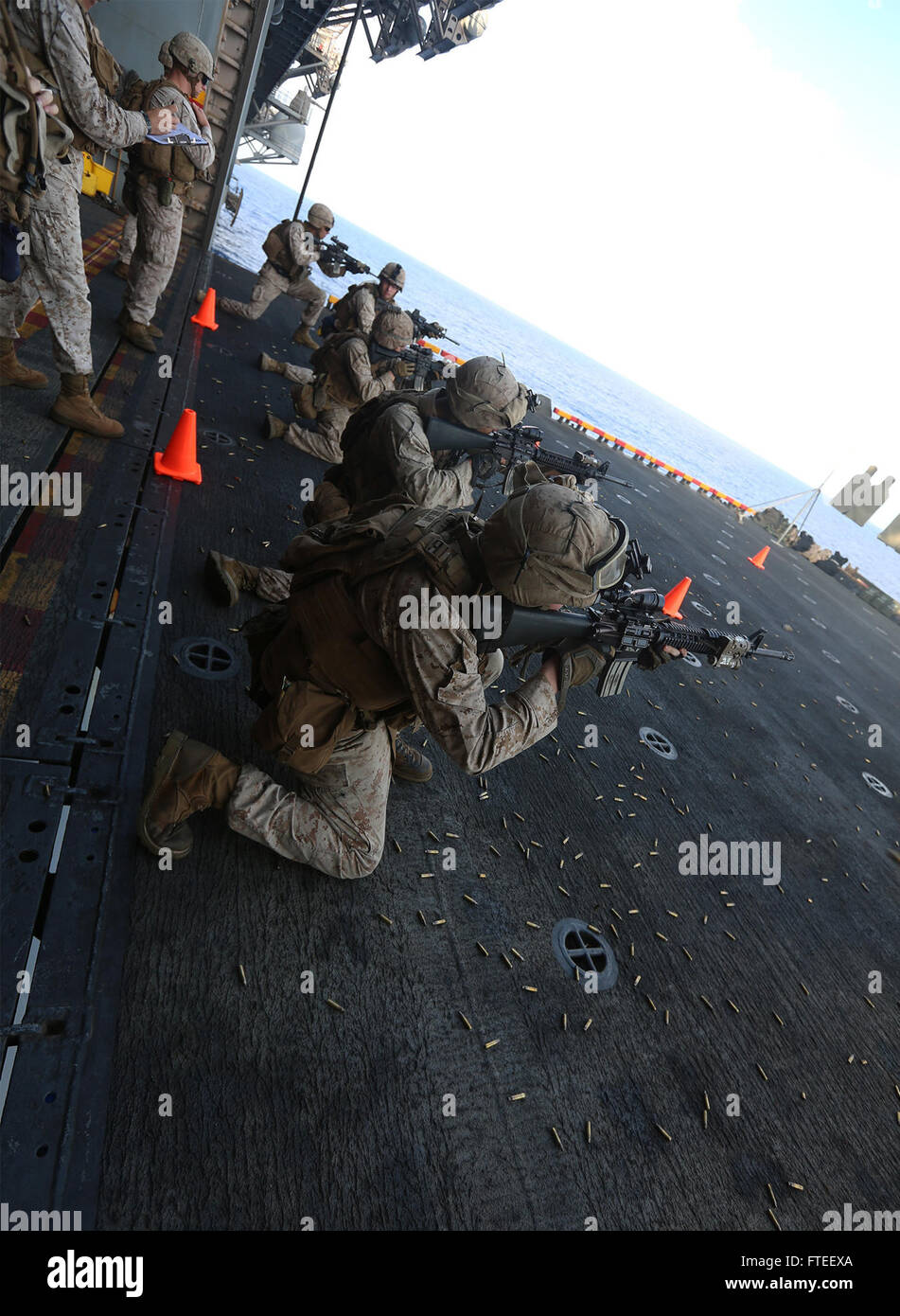 A U.S. Marine Corps live-fire training session aboard the USS Bataan in ...