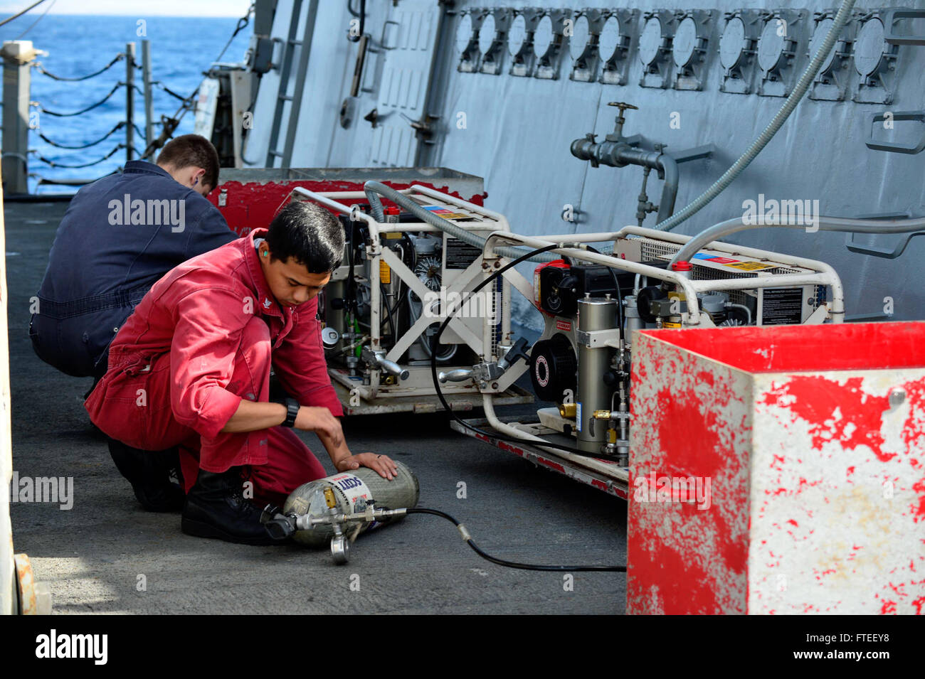 U s navy damage control fireman hi-res stock photography and images - Alamy