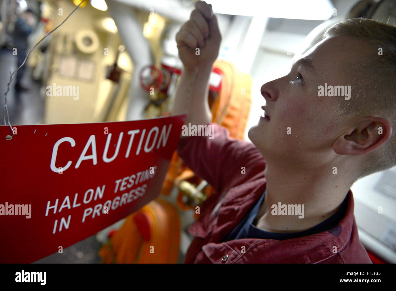 Damage Controlman Fireman Apprentice Parker Thomas aboard the USS Nitze ...