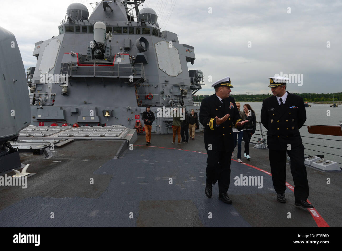 This photograph shows Cmdr. Brian Diebold of the USS Oscar Austin (DDG ...