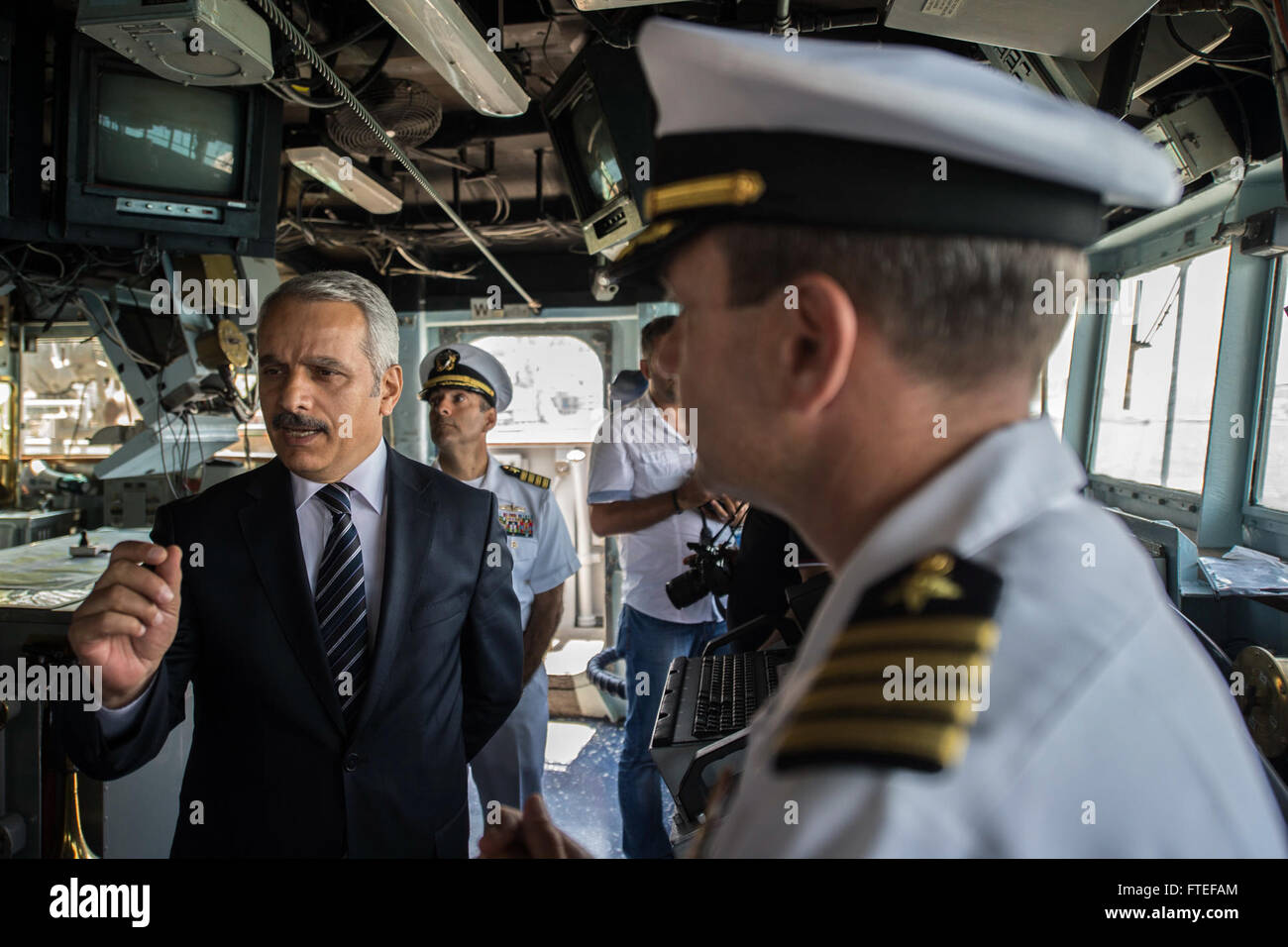 U.S. Navy Captain Robert Katz leads Turkish dignitaries on a tour of ...