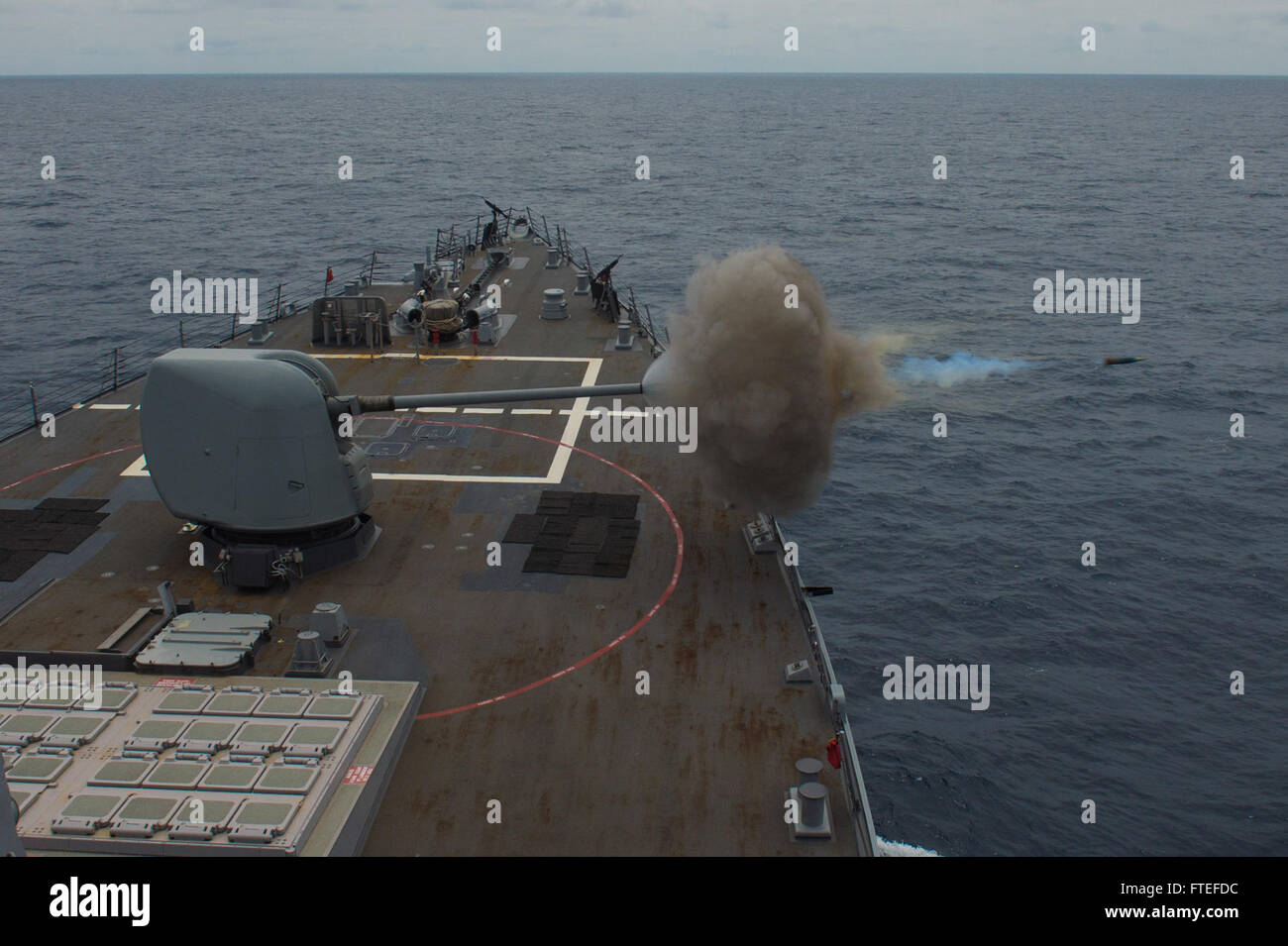 The USS Oscar Austin (DDG 79), a guided-missile destroyer, fires its 5 ...