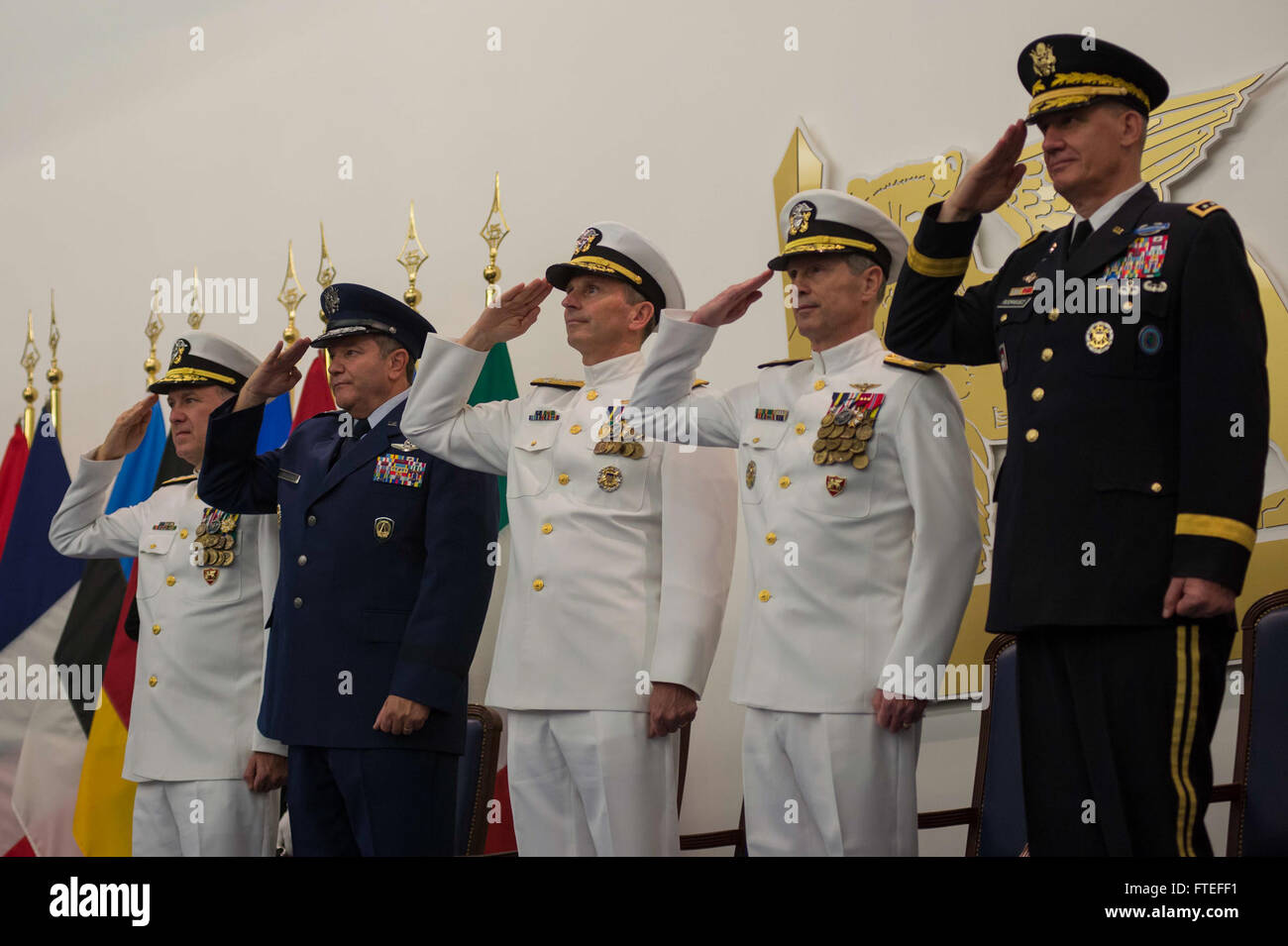 This photo captures the official party saluting during the change of ...