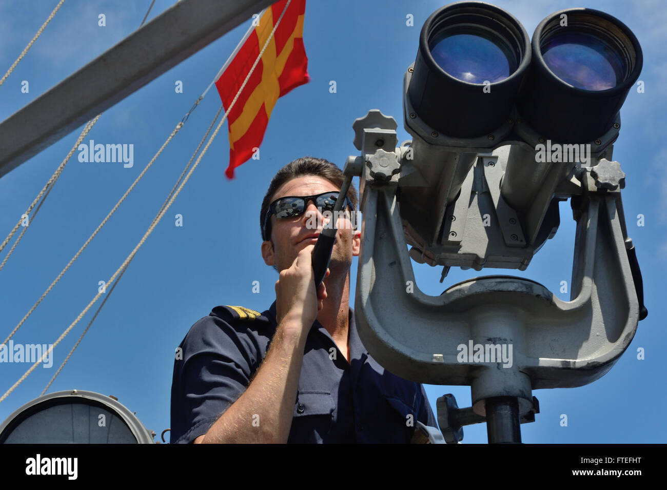 Spanish Navy Lt. Jaime Rodriguez uses advanced optics to scan for ...