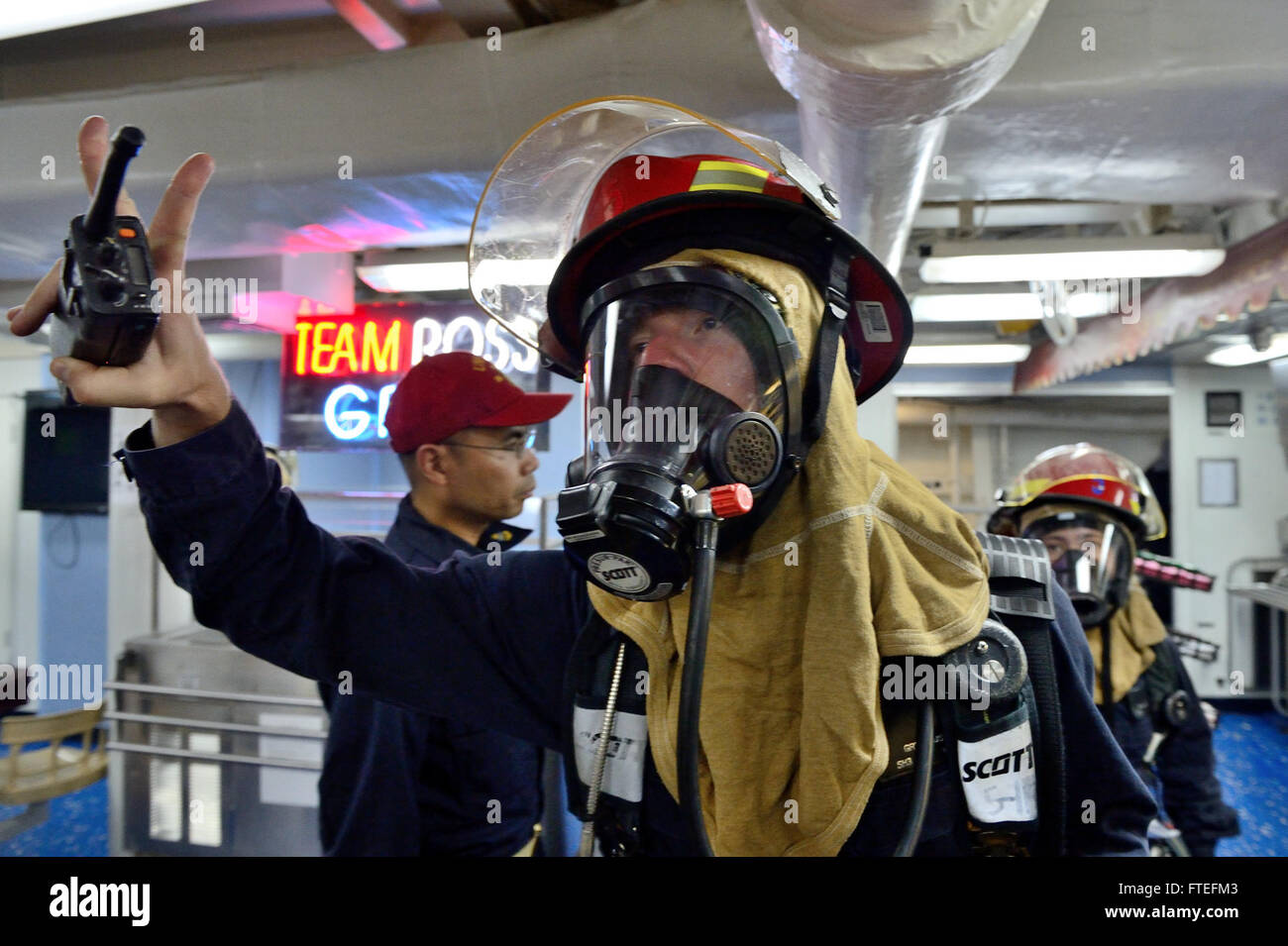 During a general quarters drill aboard the Arleigh Burke-class guided ...