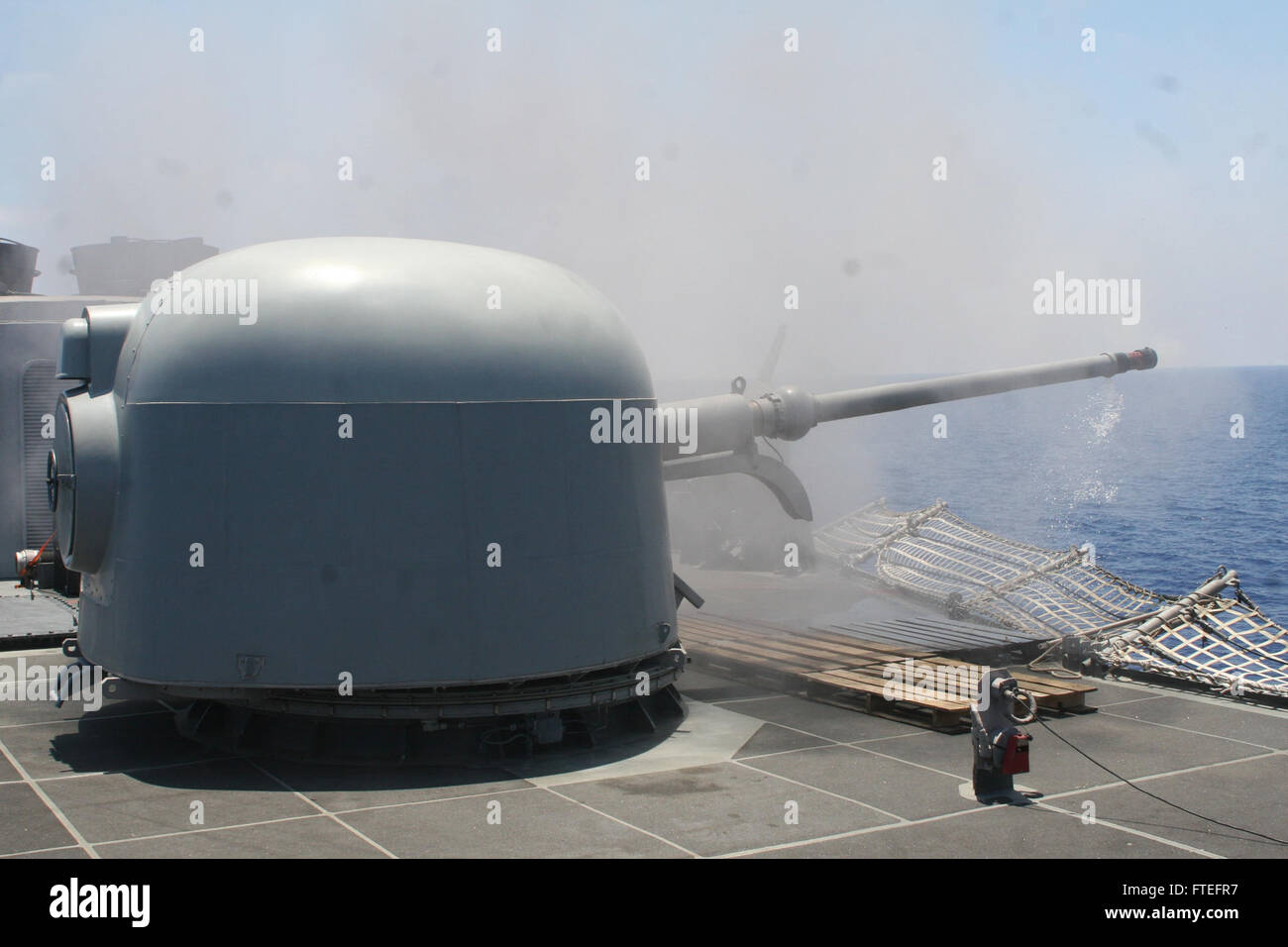 On October 19, 2014, the MK75 76mm main battery aboard the USS Samuel B ...