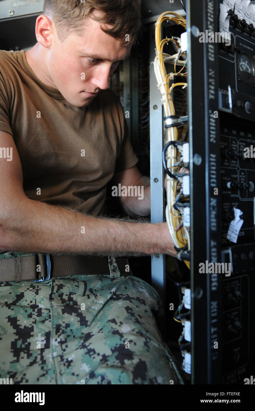 This U.S. Navy photo shows Aviation Electricians Mate 3rd Class ...